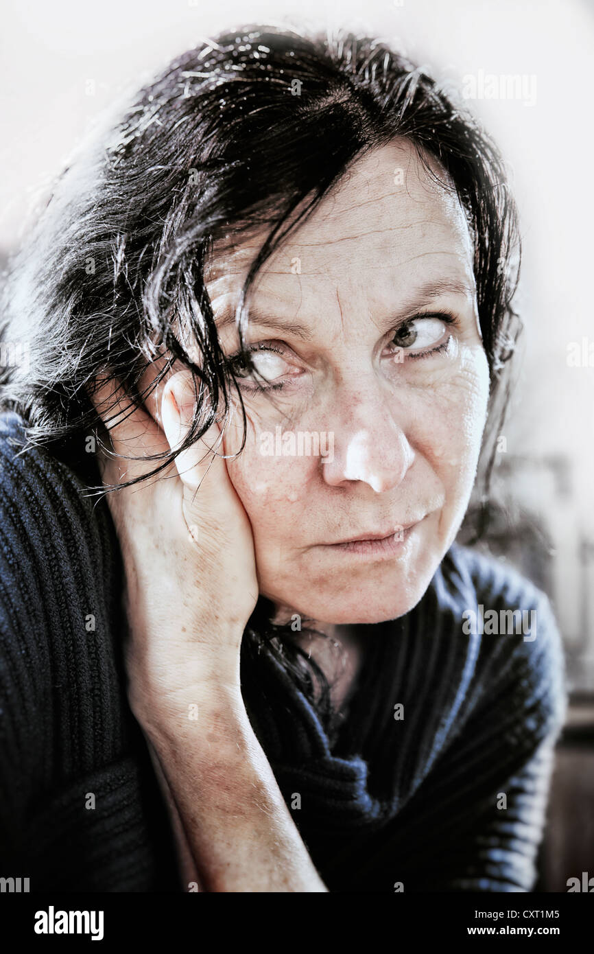 Woman crying, with bruise on her arm Stock Photo - Alamy