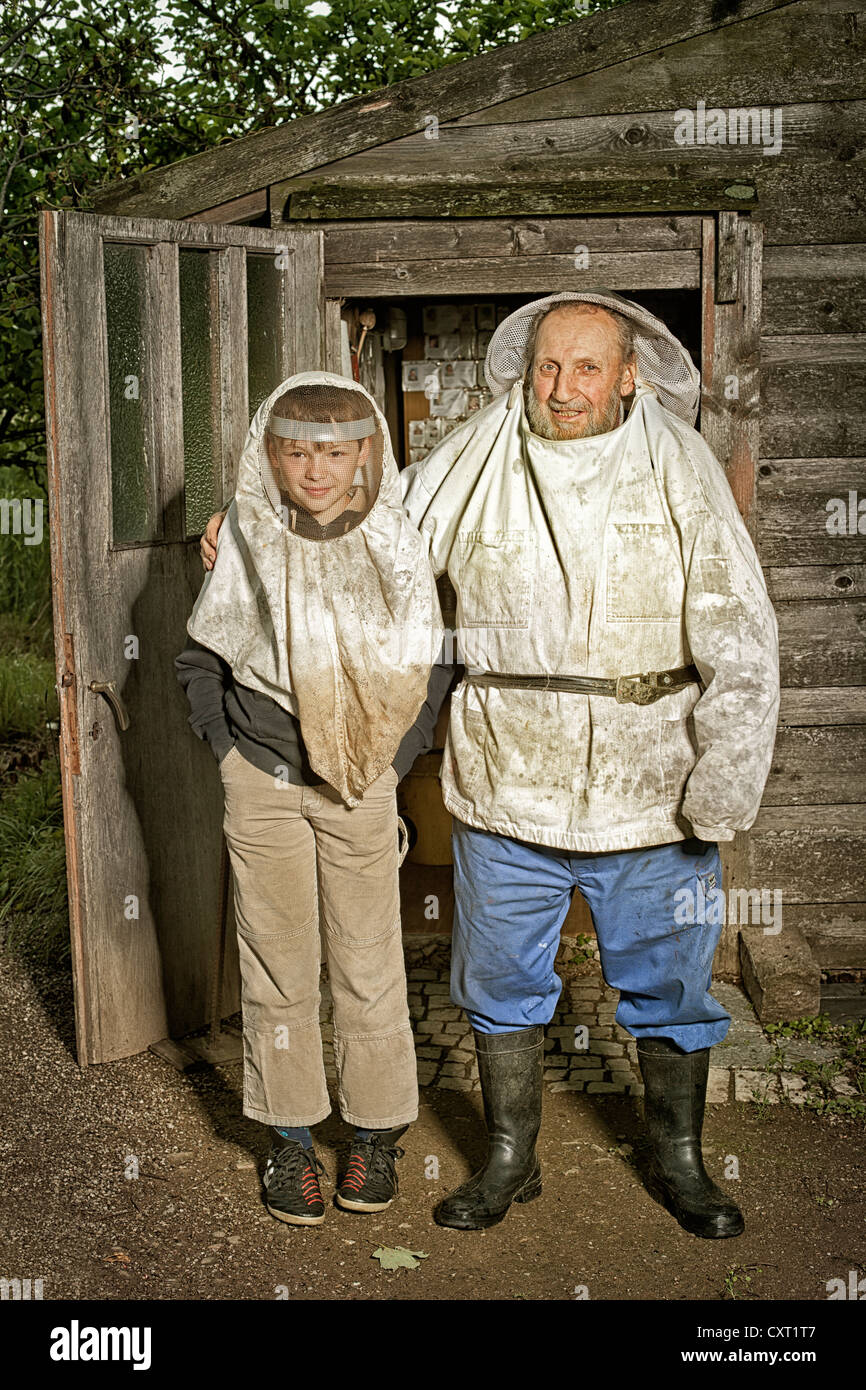 Beekeeper with "apprentice" beekeeper Stock Photo - Alamy