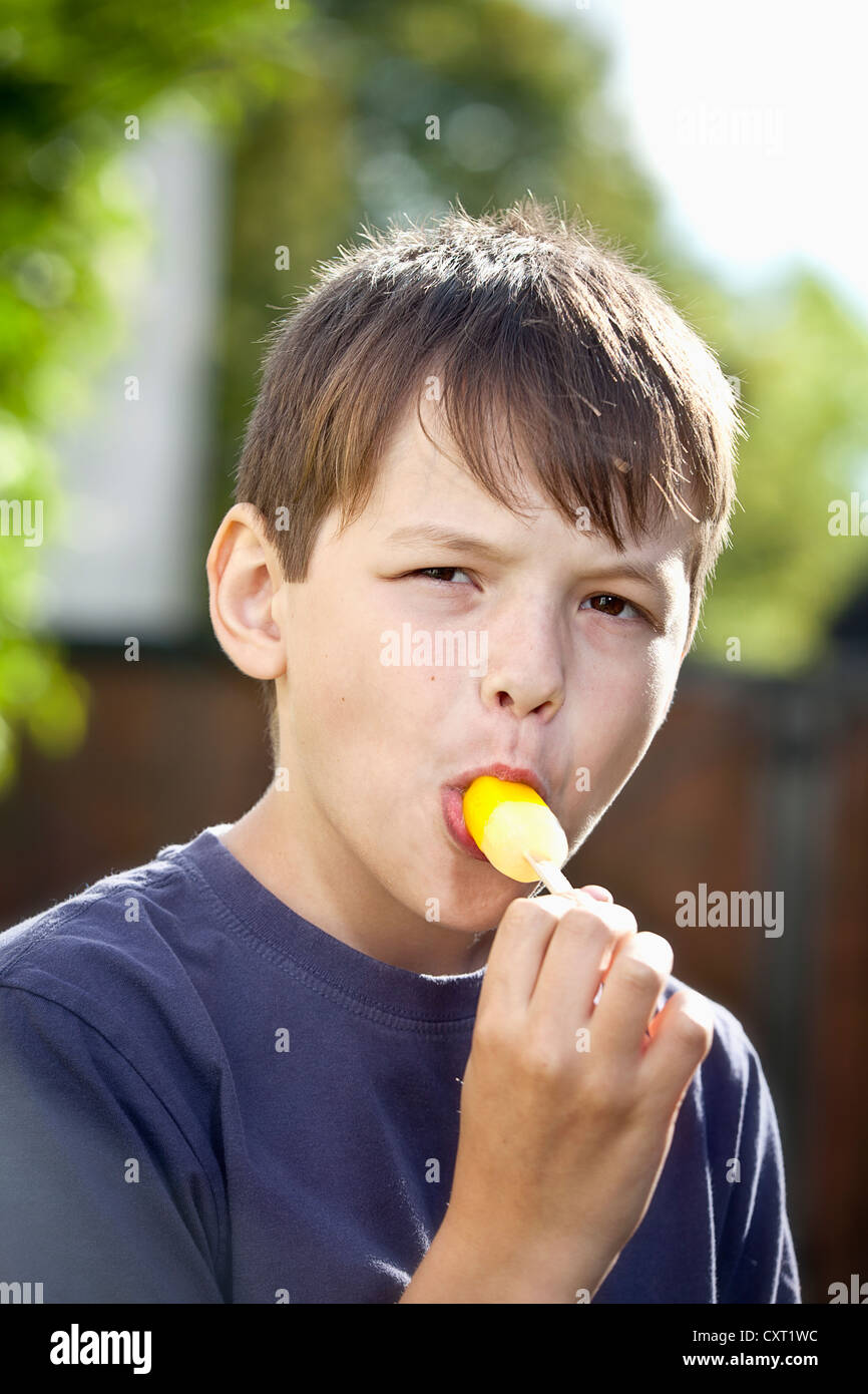Boy with an ice lolly Stock Photo - Alamy