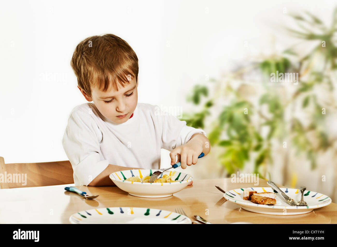 Five year old boy eating hi-res stock photography and images - Alamy