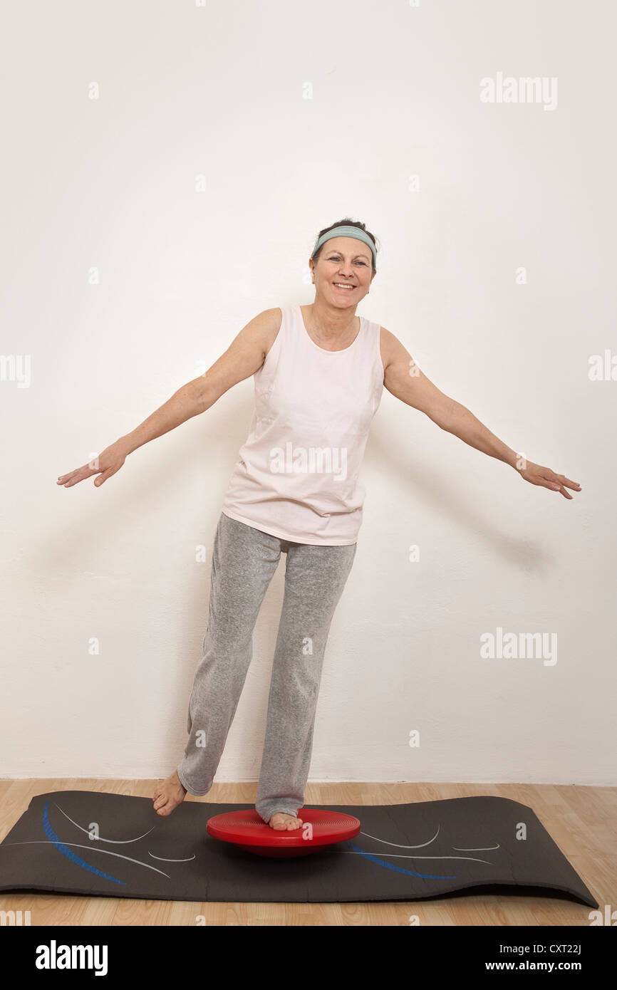 Balancing a ball hi-res stock photography and images - Alamy