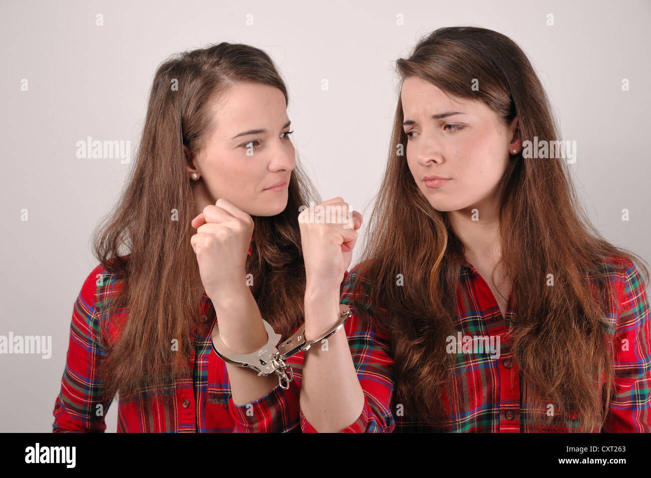 Women chained hi-res stock photography and images - Alamy