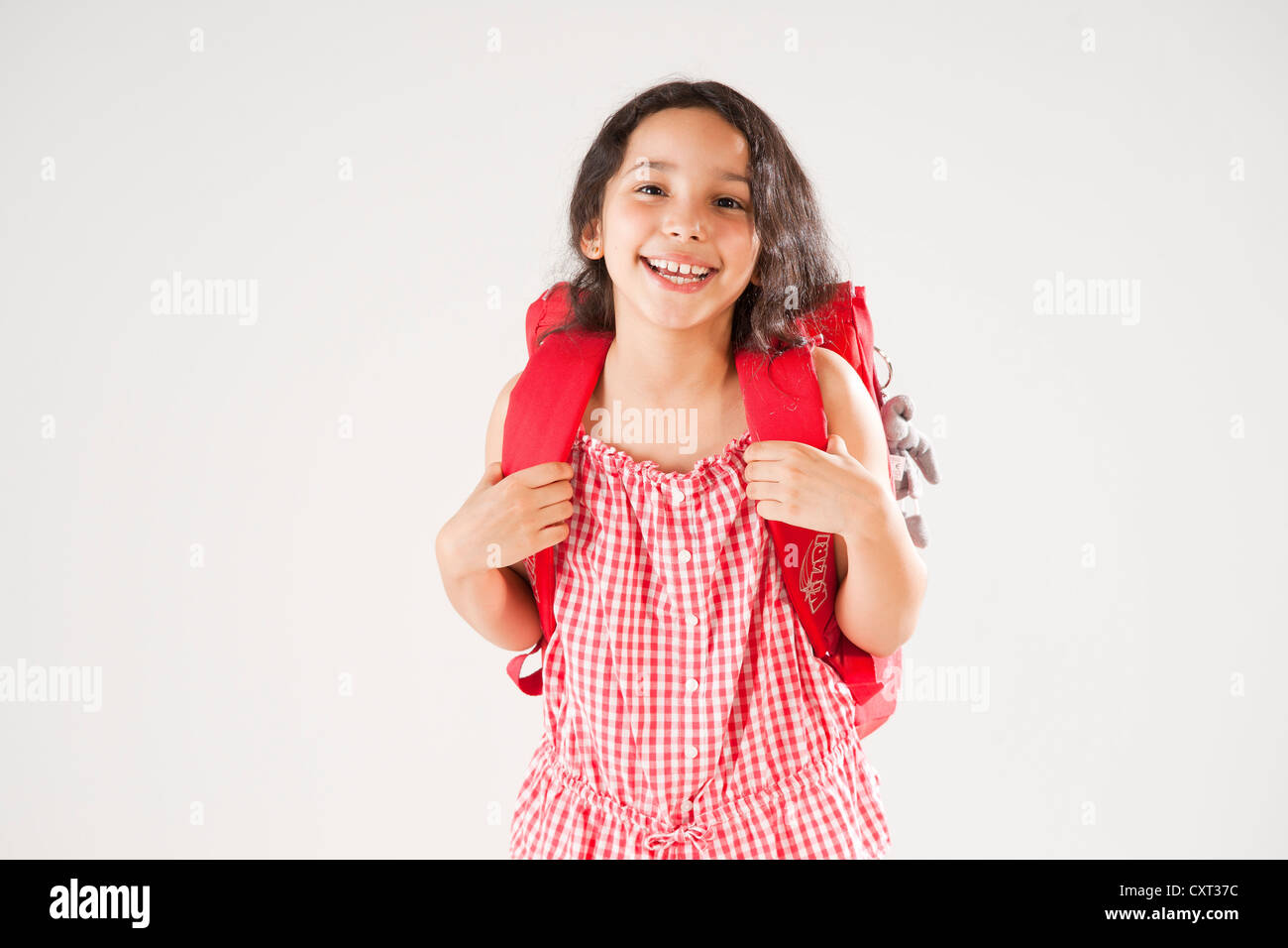 Girl with school bag Stock Photo - Alamy