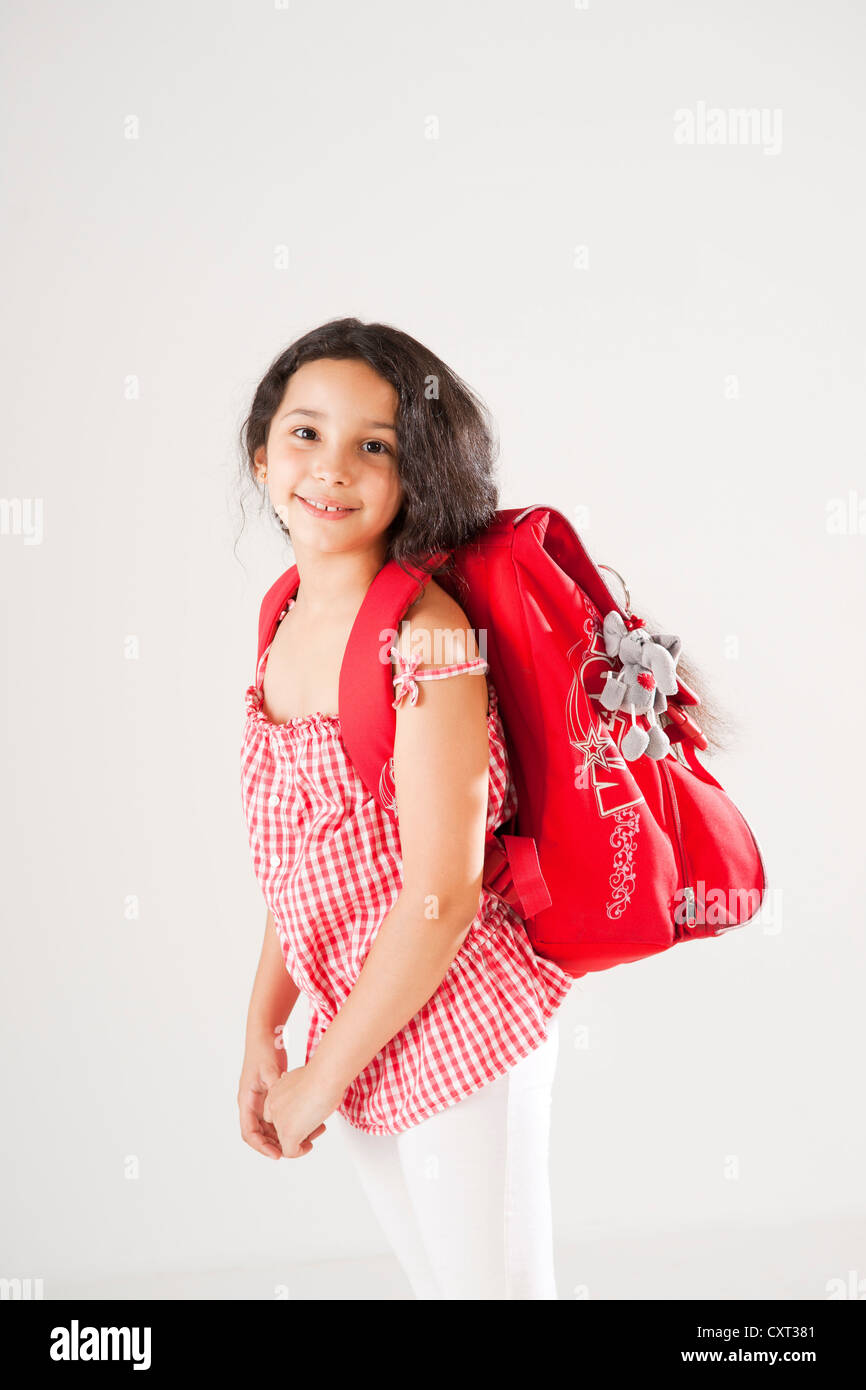 Girl with school bag Stock Photo - Alamy