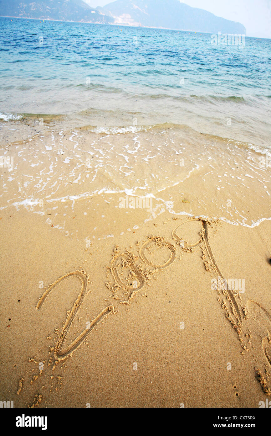 Relax written in sand wave hi-res stock photography and images - Alamy