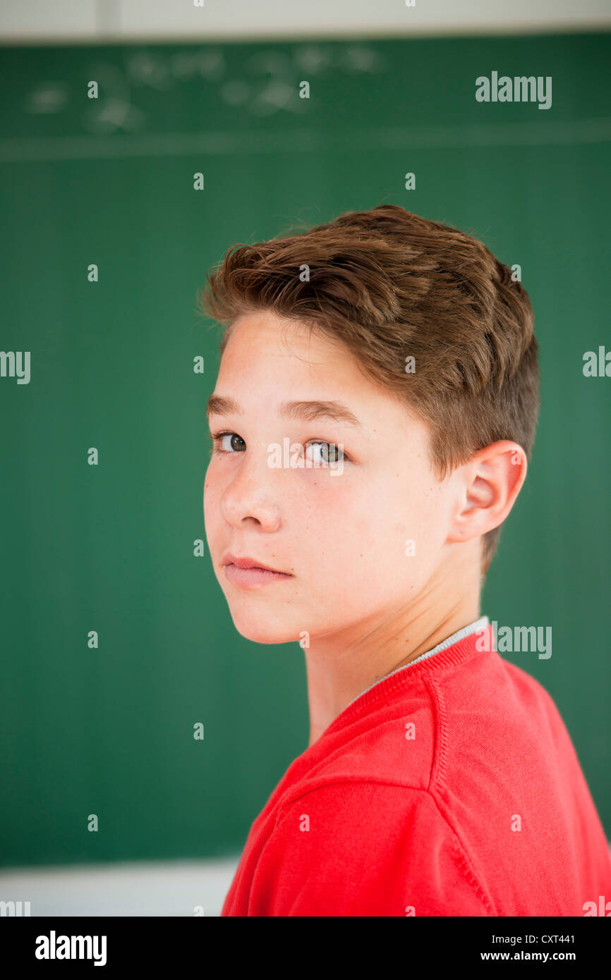 Schoolboy in a classroom, portrait Stock Photo - Alamy