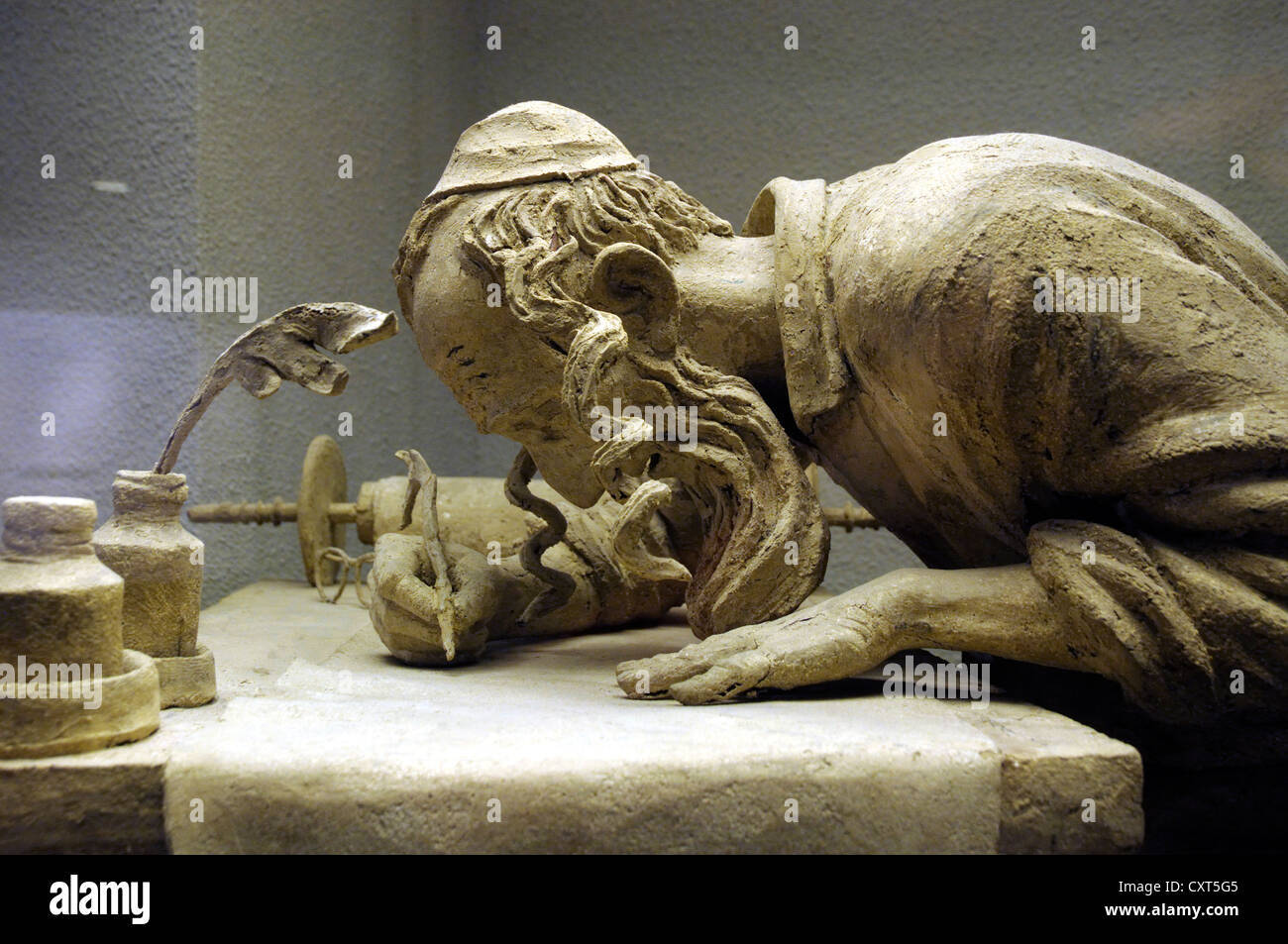 Orthodox Jew writing a Torah scroll, sculpture at the Diaspora Museum ...