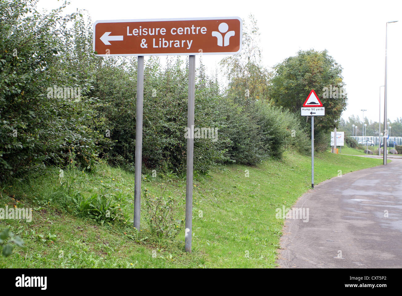 brown road leisure centre signs on side of road Stock Photo - Alamy