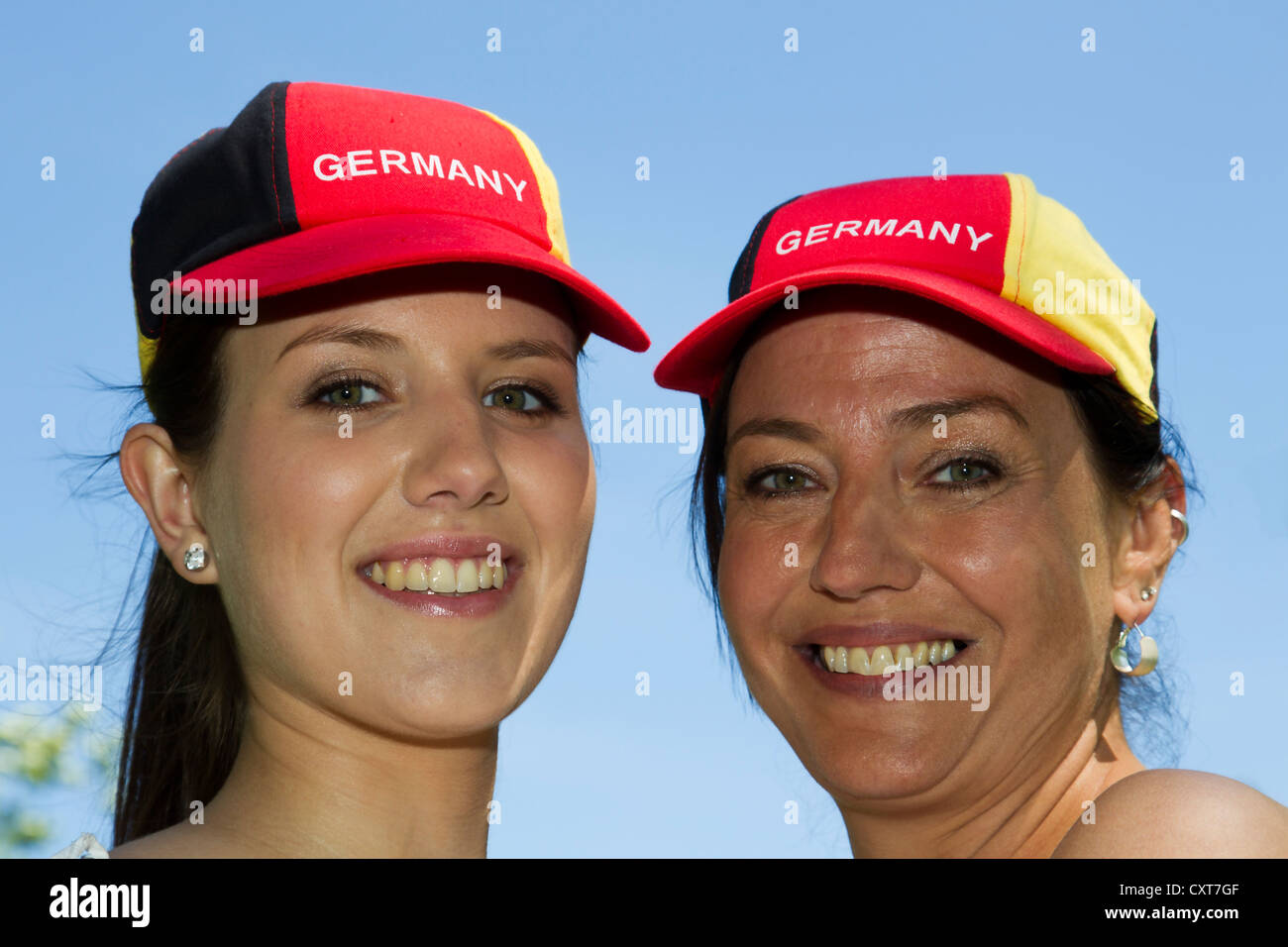 Two women wearing Germany caps, portrait Stock Photo - Alamy