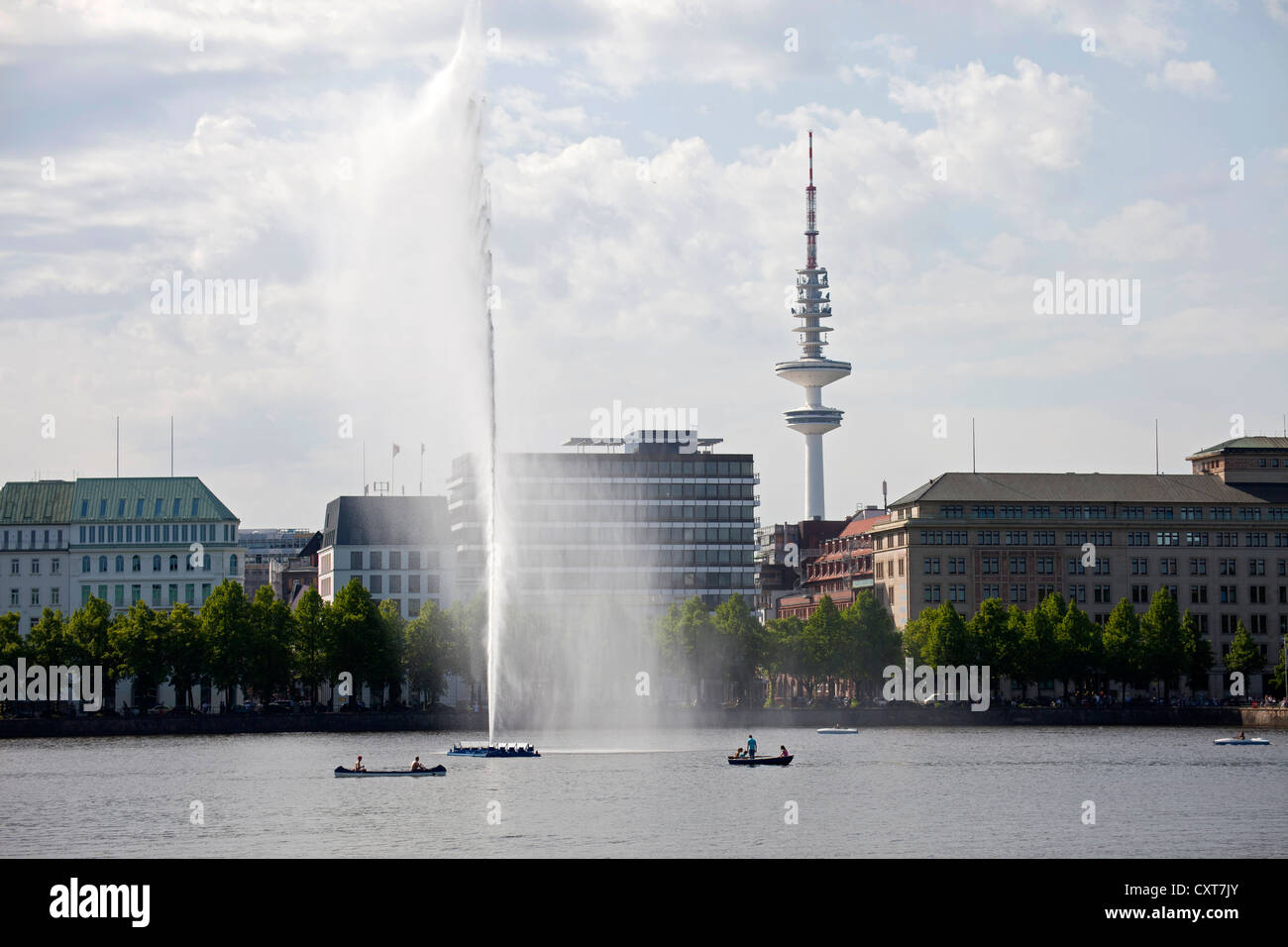 Binnenalster or Inner Alster Lake with rowing boats in front of the ...