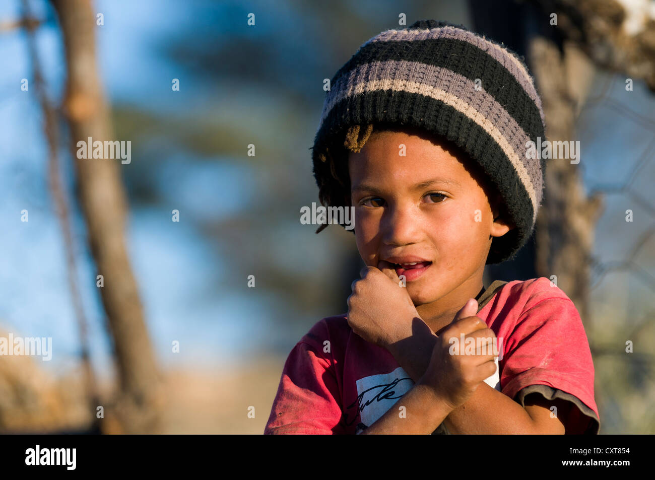 Bushmen or San boy, near Andriesvale, Kalahari Desert, Northern Cape ...