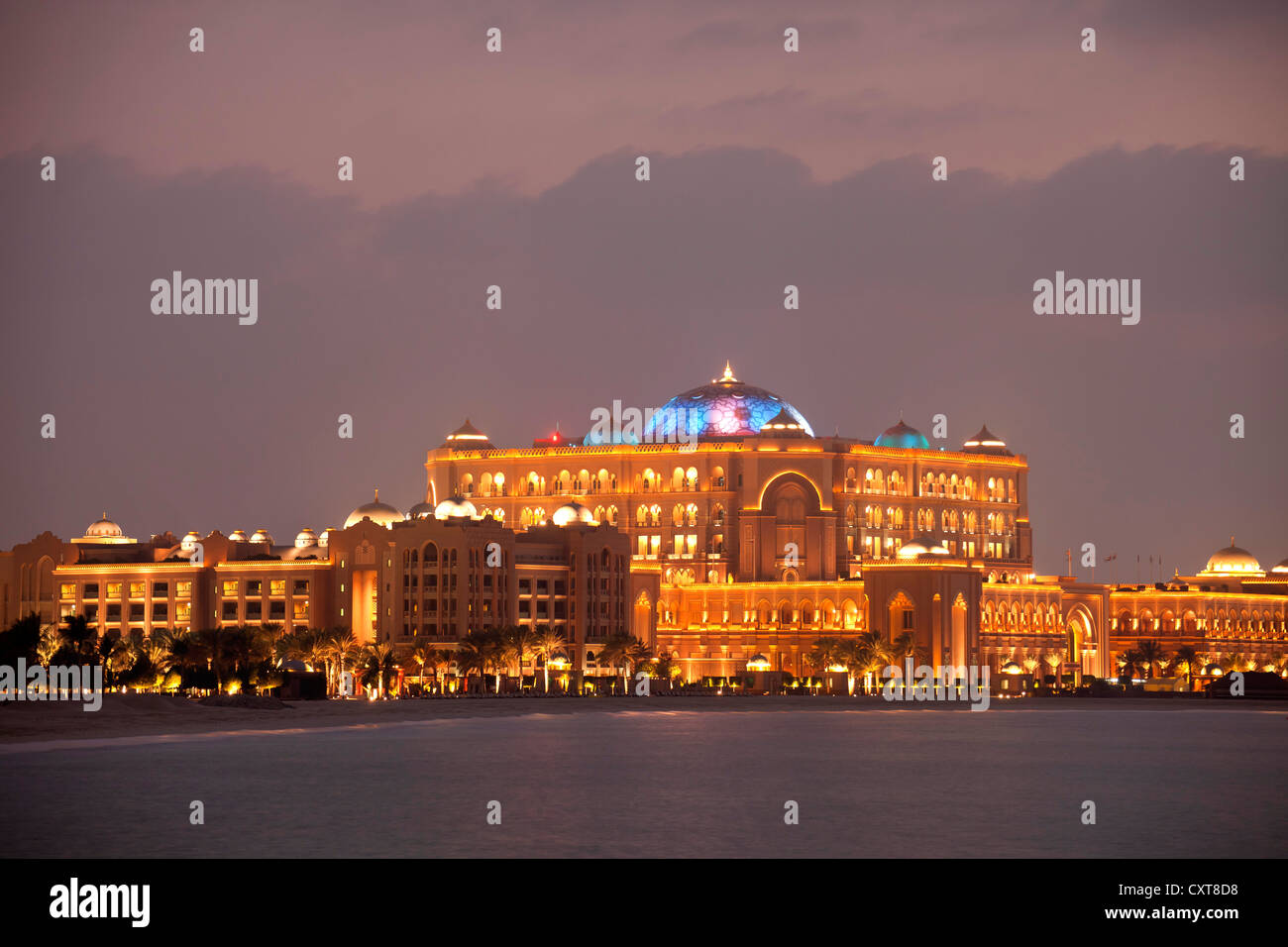 The Emirates Palace luxury hotel, illuminated at the blue hour, Abu ...