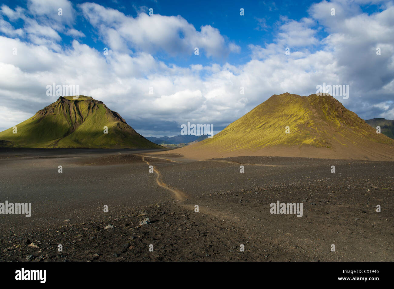 Trail through the Black Lava Desert, with moss-covered Hattfell ...