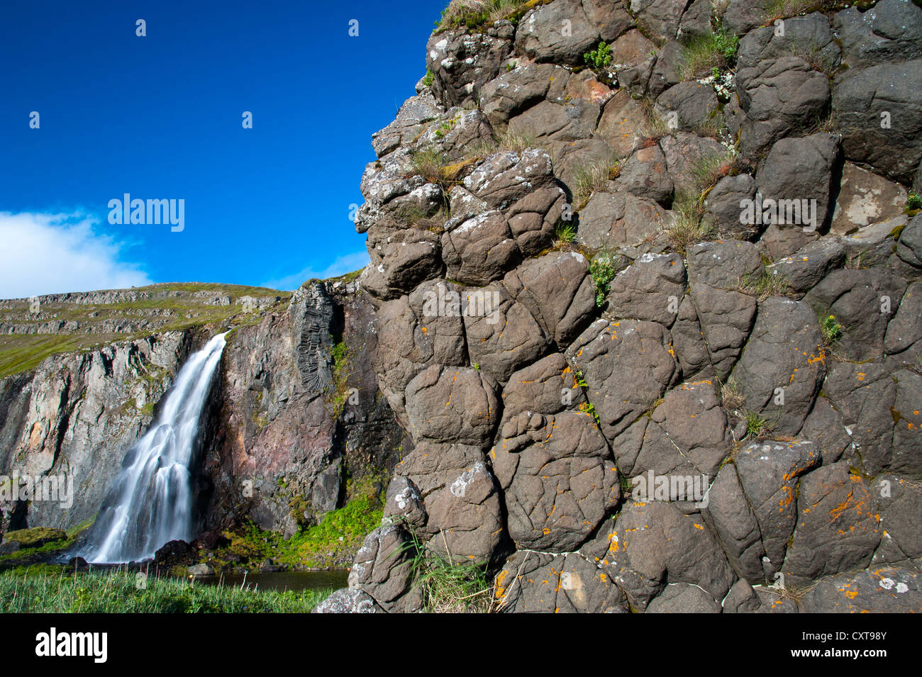 Waterfall on the hiking trail to the bird cliffs of Hornbjarg ...