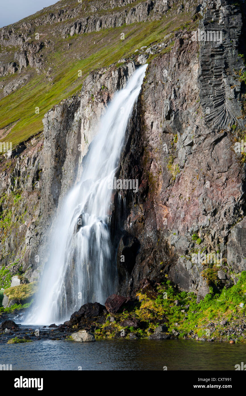 Waterfall on the hiking trail to the bird cliffs of Hornbjarg ...