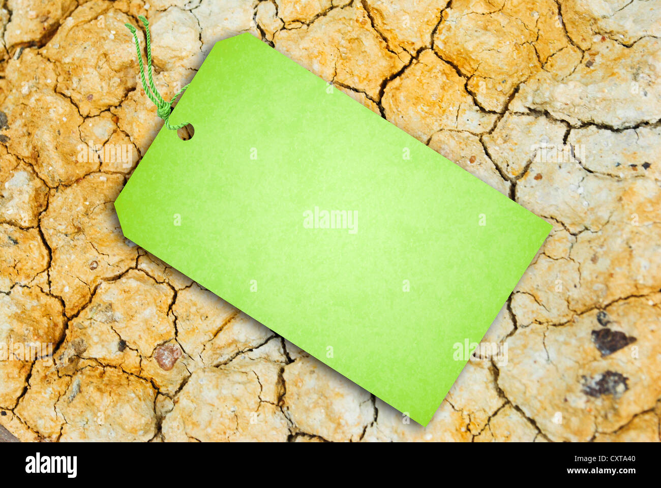 Sale Tag Isolated On Dry soil texture Stock Photo - Alamy