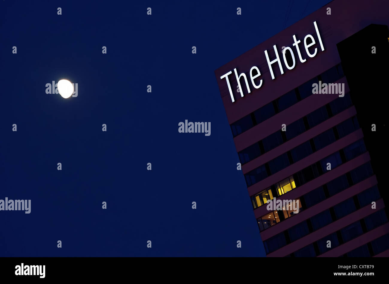 The Hotel and Moon at Night Stock Photo - Alamy