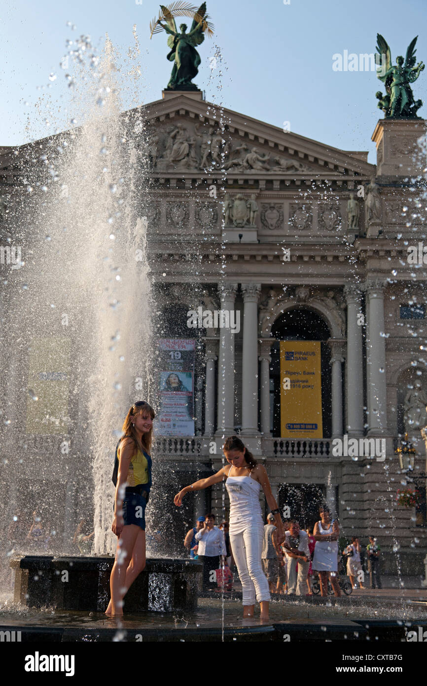 People playing in the fountain, L'viv old town,Ukraine Stock Photo - Alamy