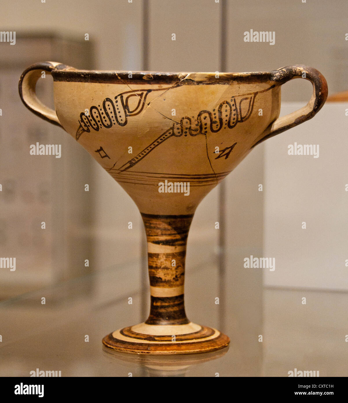 Terracotta kylix (drinking cup) with whorl shells Late Helladic IIIB ...