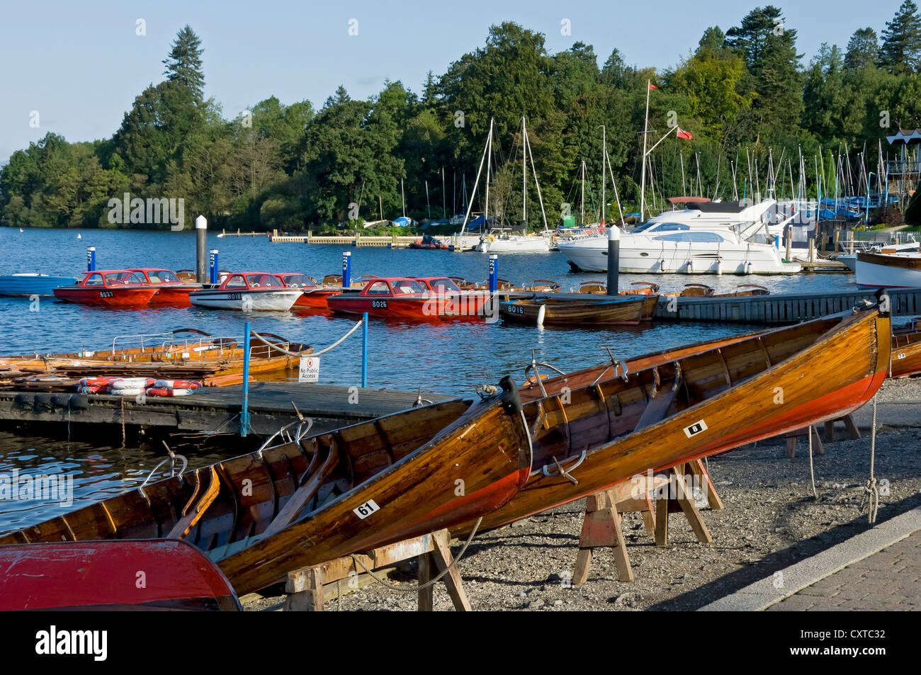 Rowing boats boat at the lakeside in summer Bowness on Windermere Lake ...
