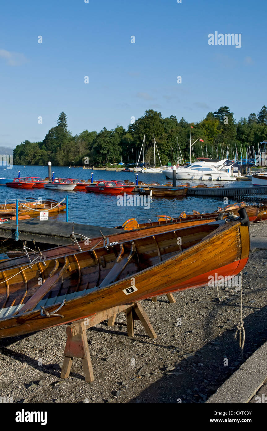 Rowing boat boats at the lakeside in summer Bowness on Windermere Lake ...