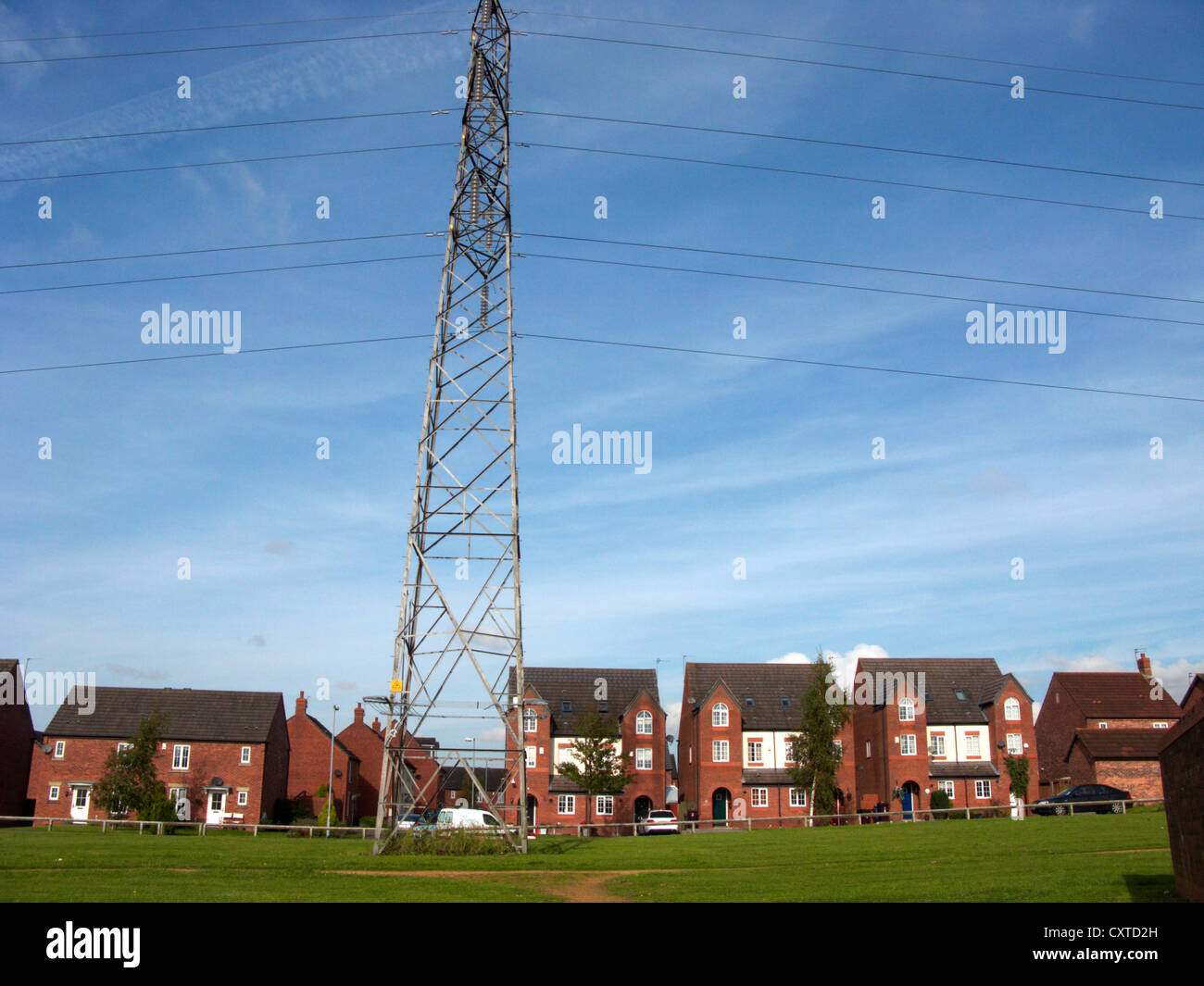 electricity transmission tower pylon above residential houses liverpool ...