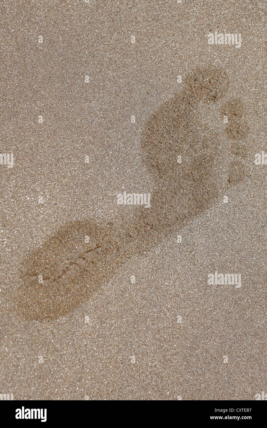 Right foot footprints in the sand Stock Photo - Alamy