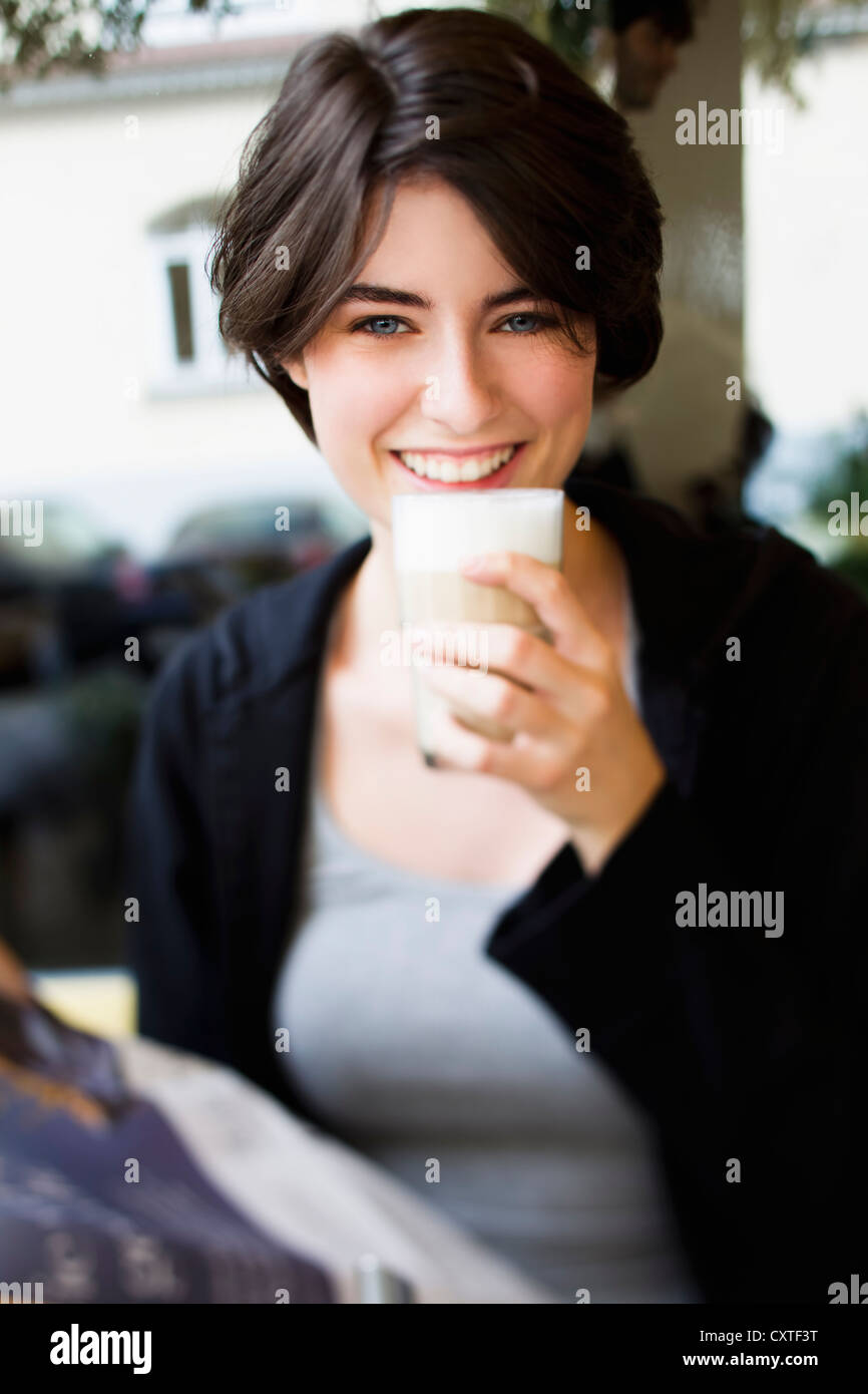 Woman enjoying iced coffee drink hi-res stock photography and images ...