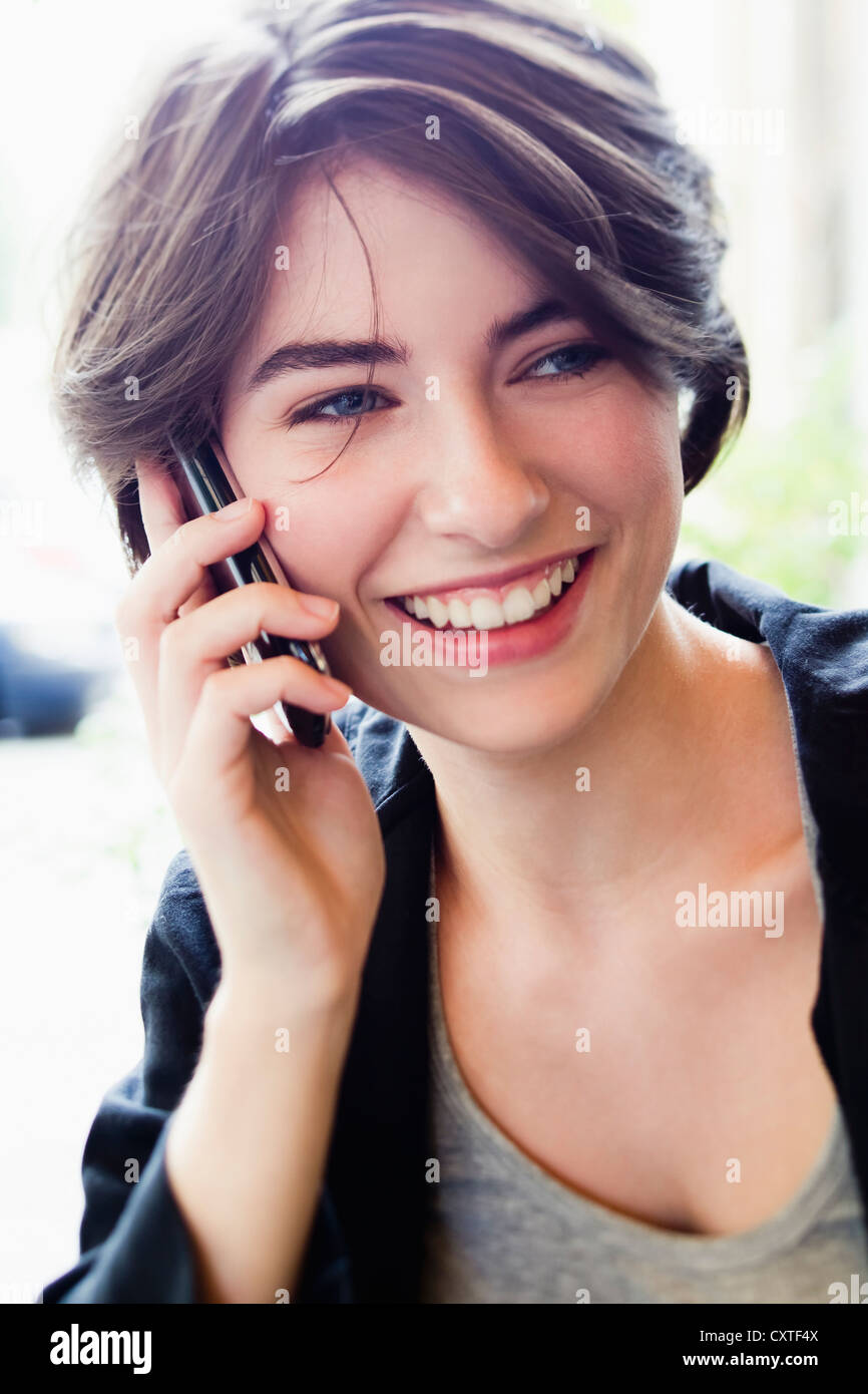 Woman talking on cell phone Stock Photo - Alamy