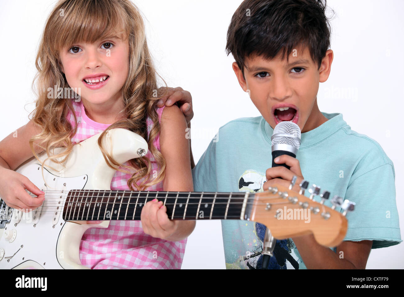 children playing music Stock Photo - Alamy
