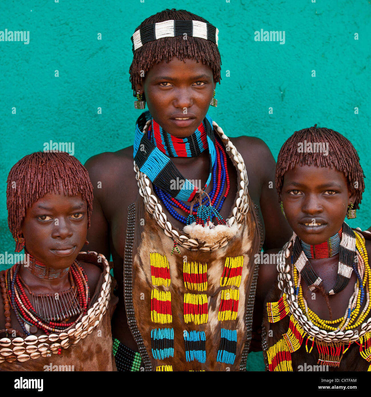 Hamar Tribe Woman And Kids With Colourful Decorations, Turmi, Omo ...