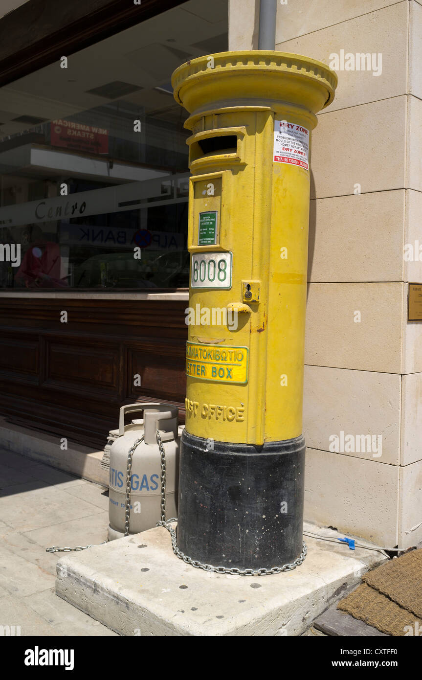 dh Postbox POST CYPRUS Old British yellow pillarbox box Stock Photo - Alamy