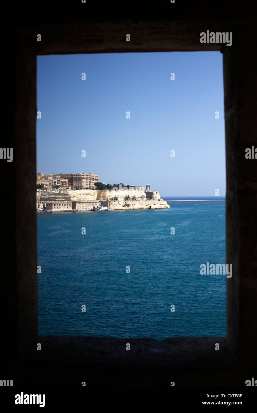 Valletta , capital of Malta, is seen trough a window at the Fort Saint ...