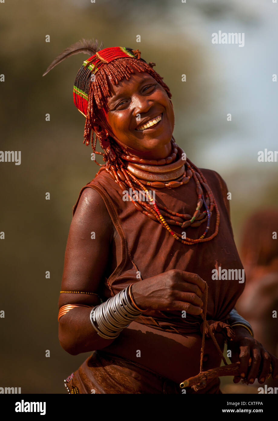 Hamar Tribe Woman Laughing At Bull Fighting Ceremony, Turmi, Omo Valley ...