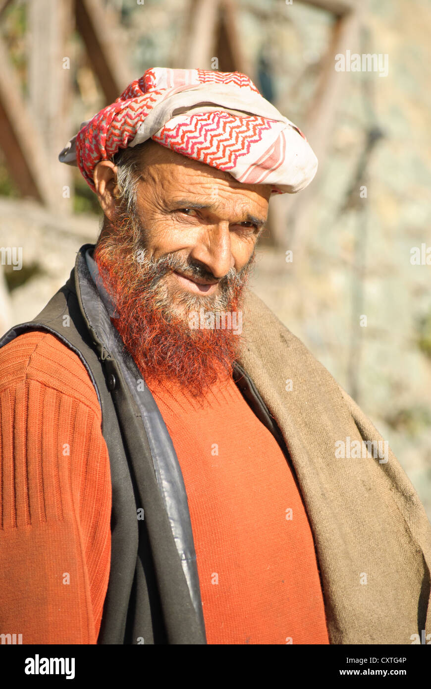 A charming Kashmir man with red beard Stock Photo - Alamy
