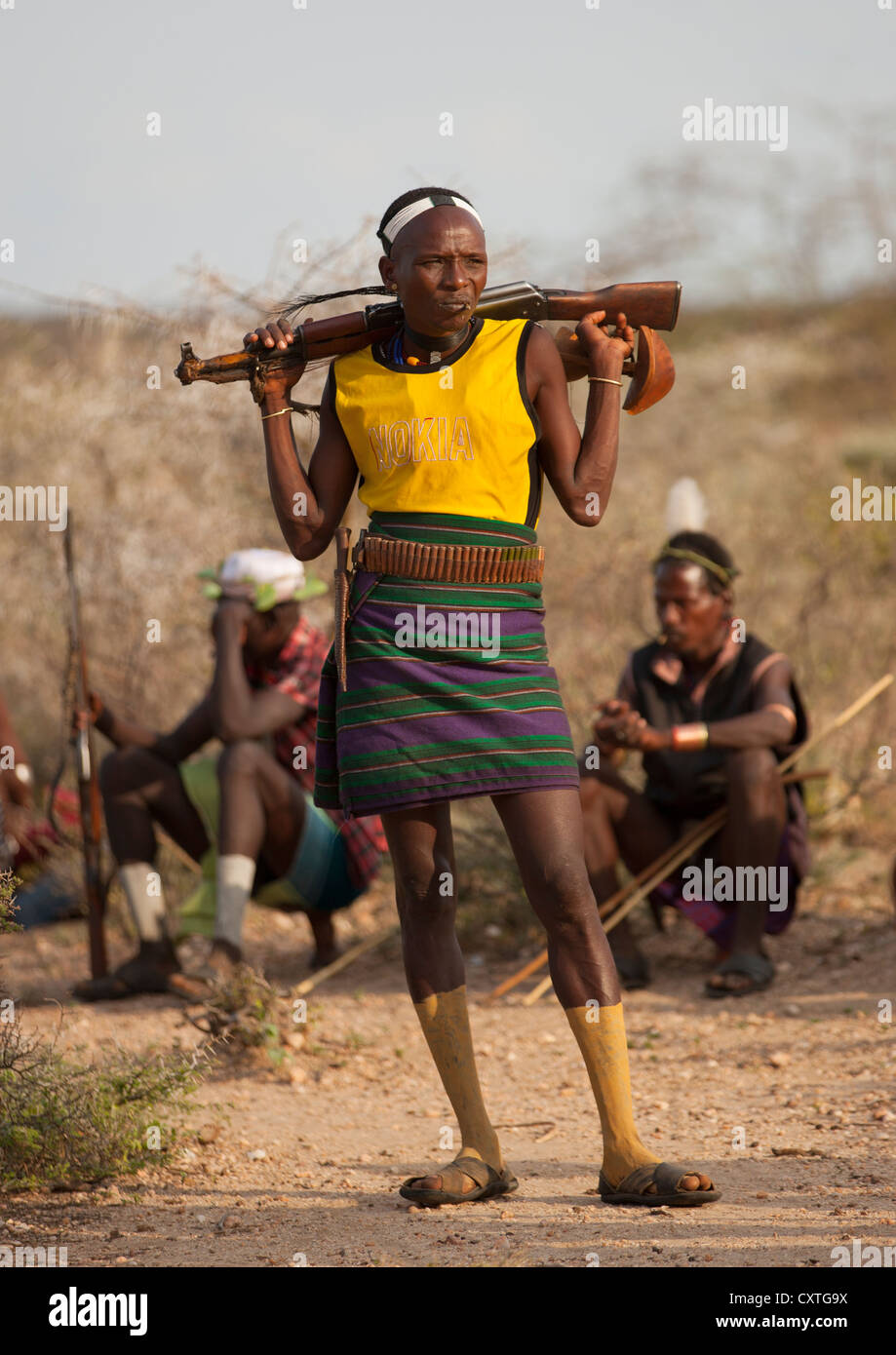 Hamar Tribe Men With Rifles At Bull Jumping Ceremony, Turmi, Omo Valley ...