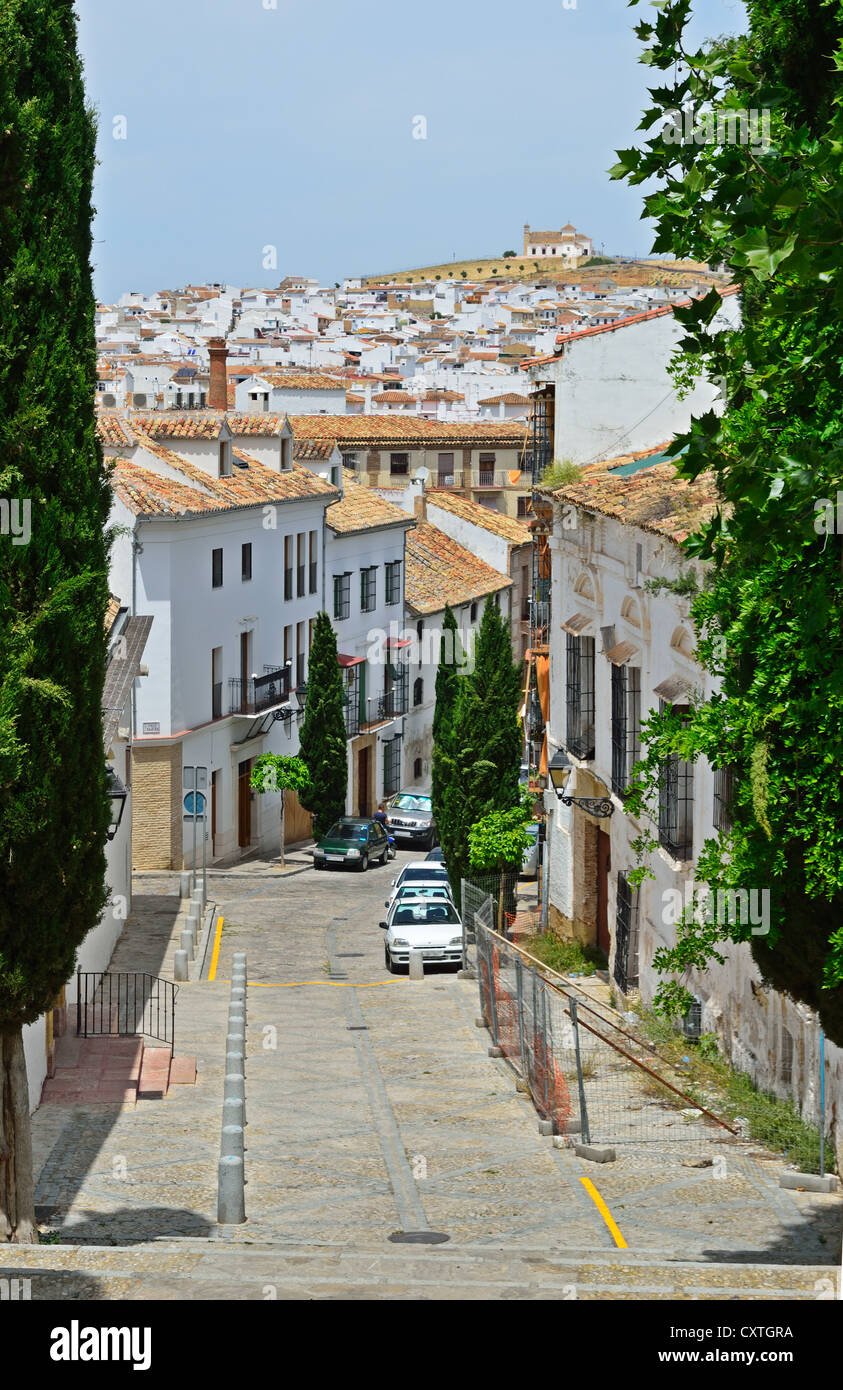 Steep street of Spanish white town Antequera Stock Photo - Alamy