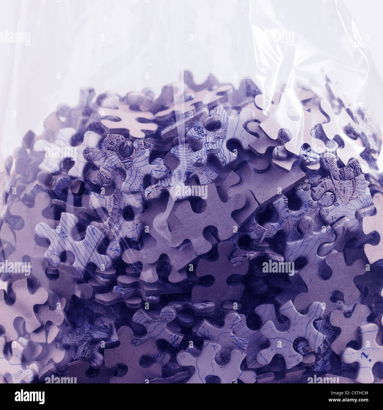 Jigsaw puzzle pieces in transparent hi-res stock photography and images ...