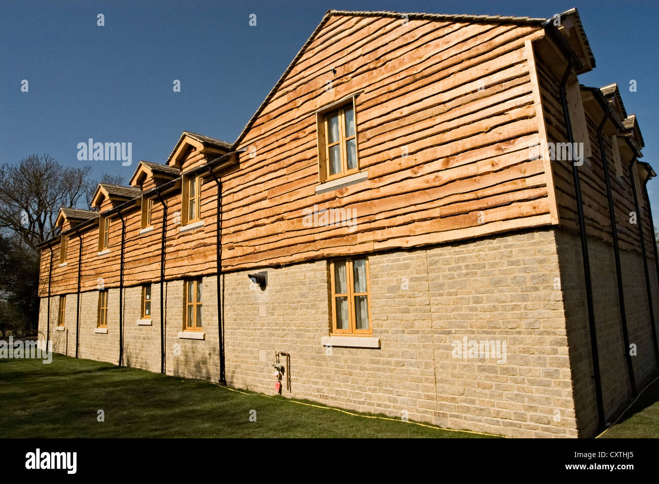 Wooden cladding on a building to fit in with its surroundings Stock ...