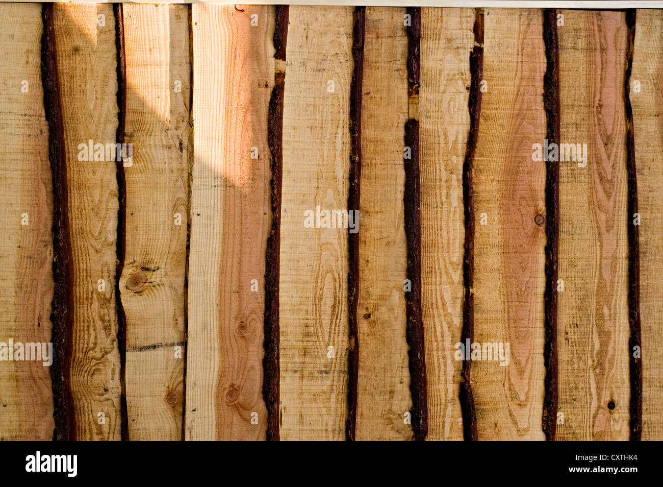 Wooden cladding cover on a building Stock Photo - Alamy