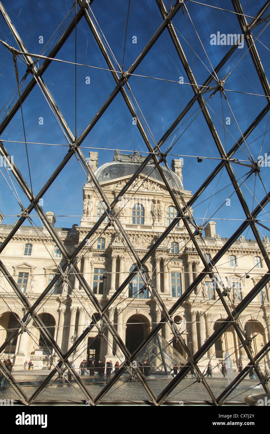 Louvre inside pyramid hi-res stock photography and images - Alamy