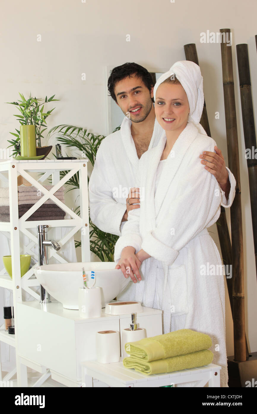 Couple stood in the bathroom Stock Photo - Alamy