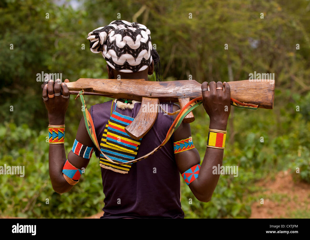 Bana Tribe Man With A Wooden Kalshnikov, Key Afer, Omo Valley, Ethiopia ...
