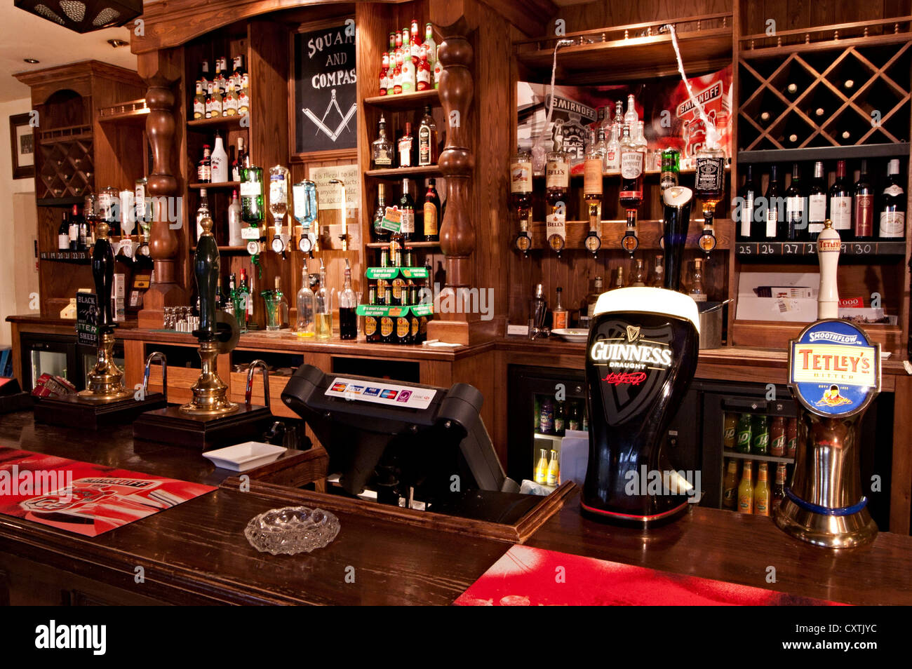 the square and compass pub beer lager bar pump Stock Photo - Alamy