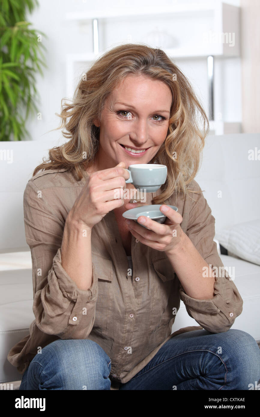 woman drinking tea Stock Photo - Alamy