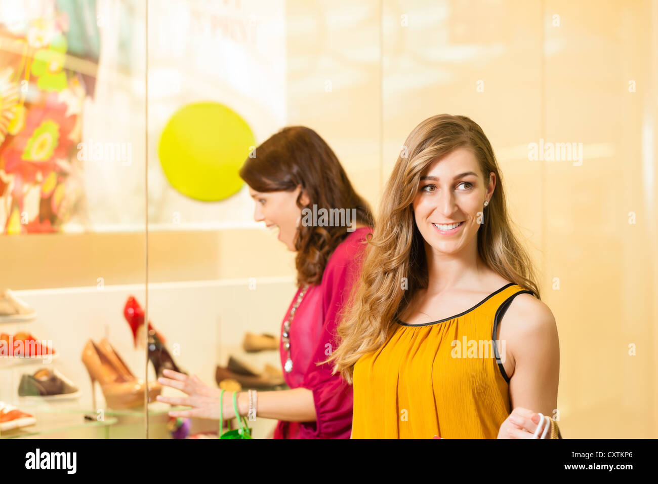 Shopping in a mall hi-res stock photography and images - Alamy