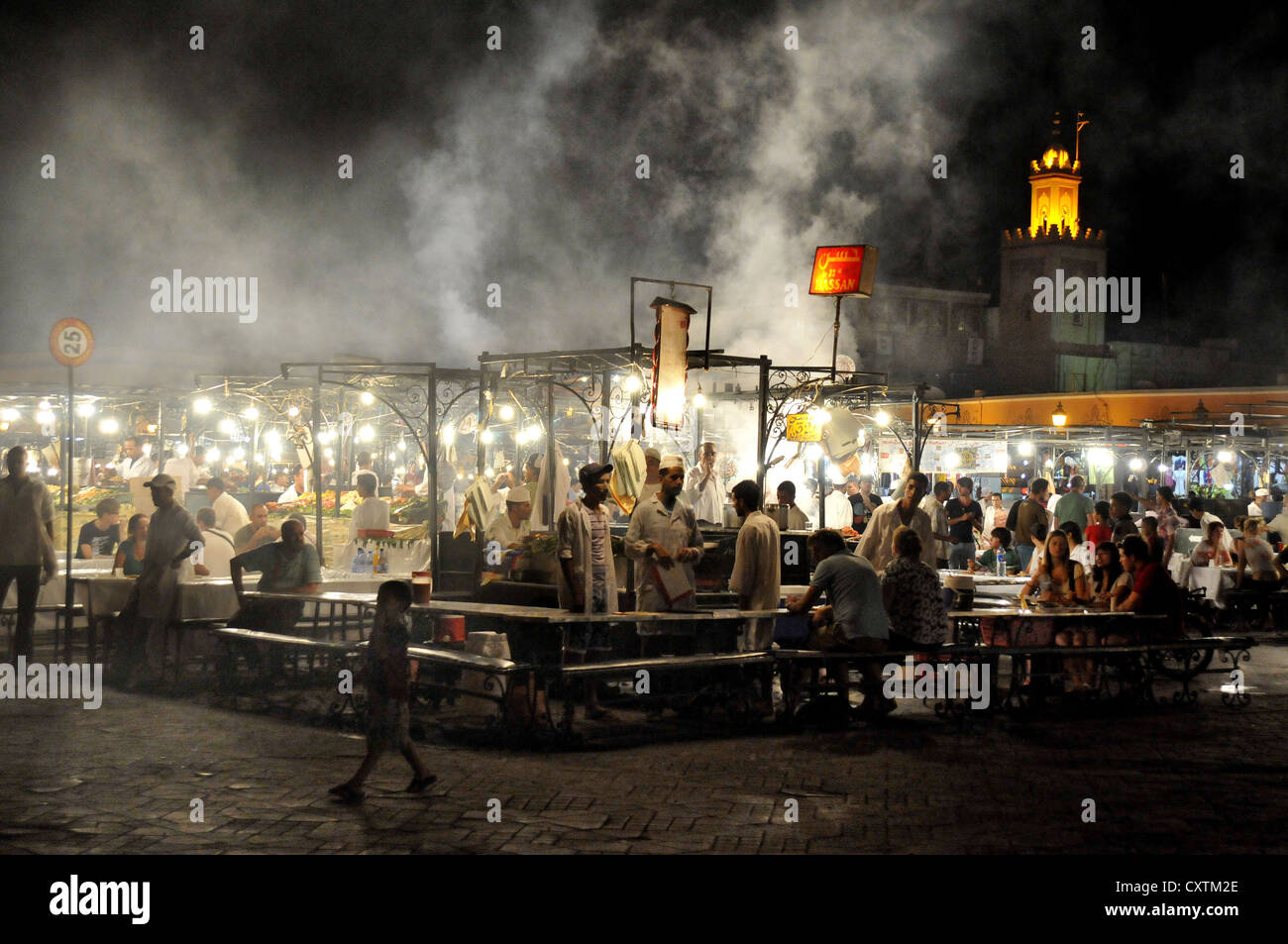 Smoke rises above the food stalls in the Djemma El Fna Square in the ...