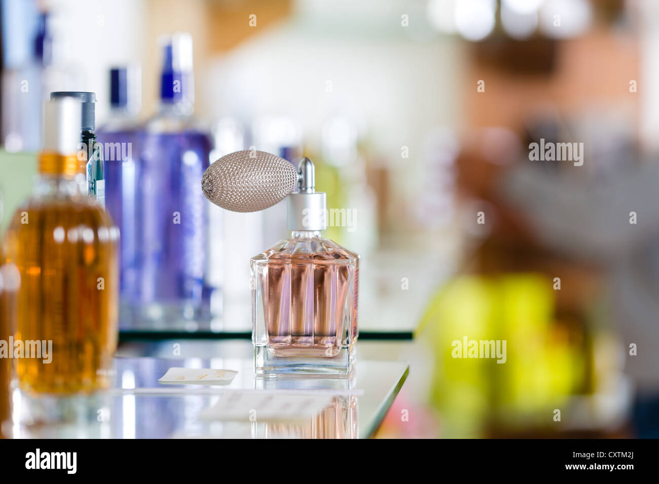 Perfume in drugstore or shop for testing Stock Photo - Alamy
