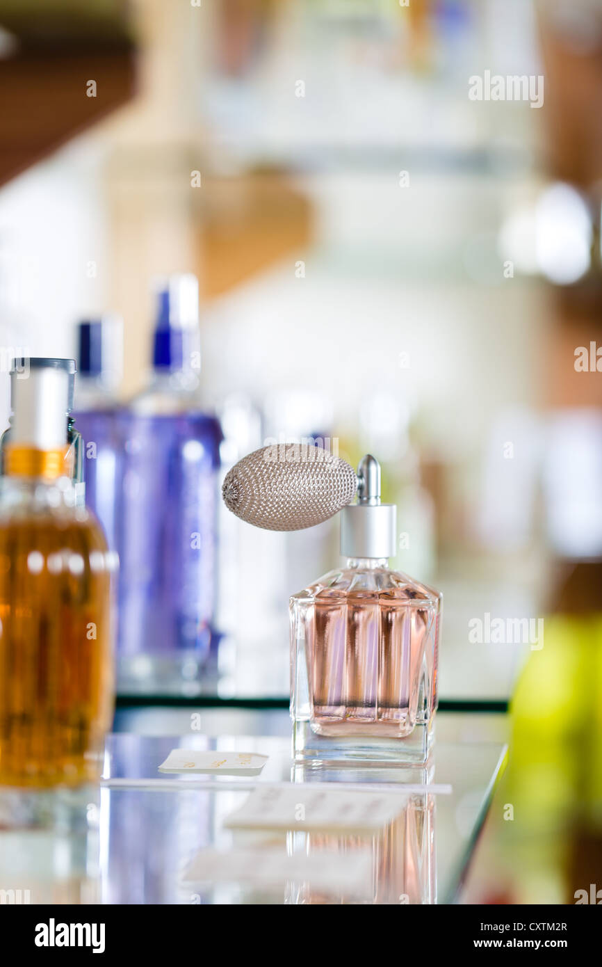 Perfume in drugstore or shop for testing Stock Photo - Alamy