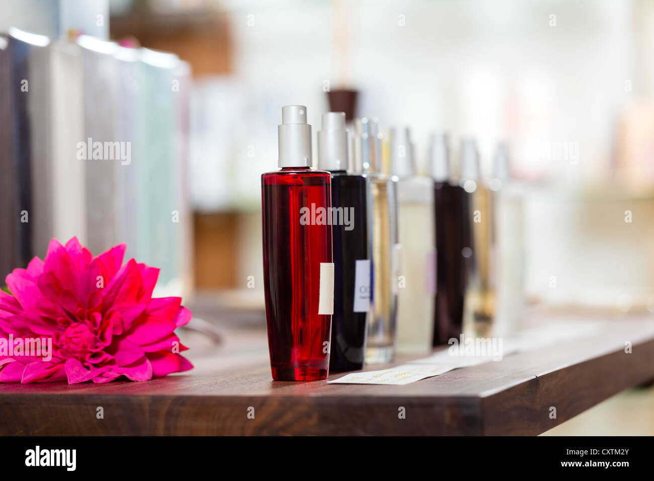 Perfume in drugstore or shop for testing Stock Photo - Alamy